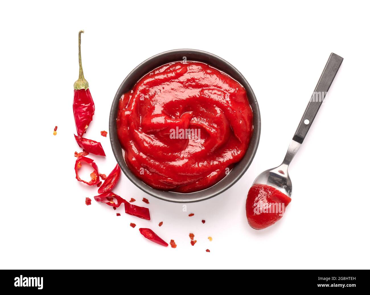Bowl of chili sauce on white background Stock Photo - Alamy