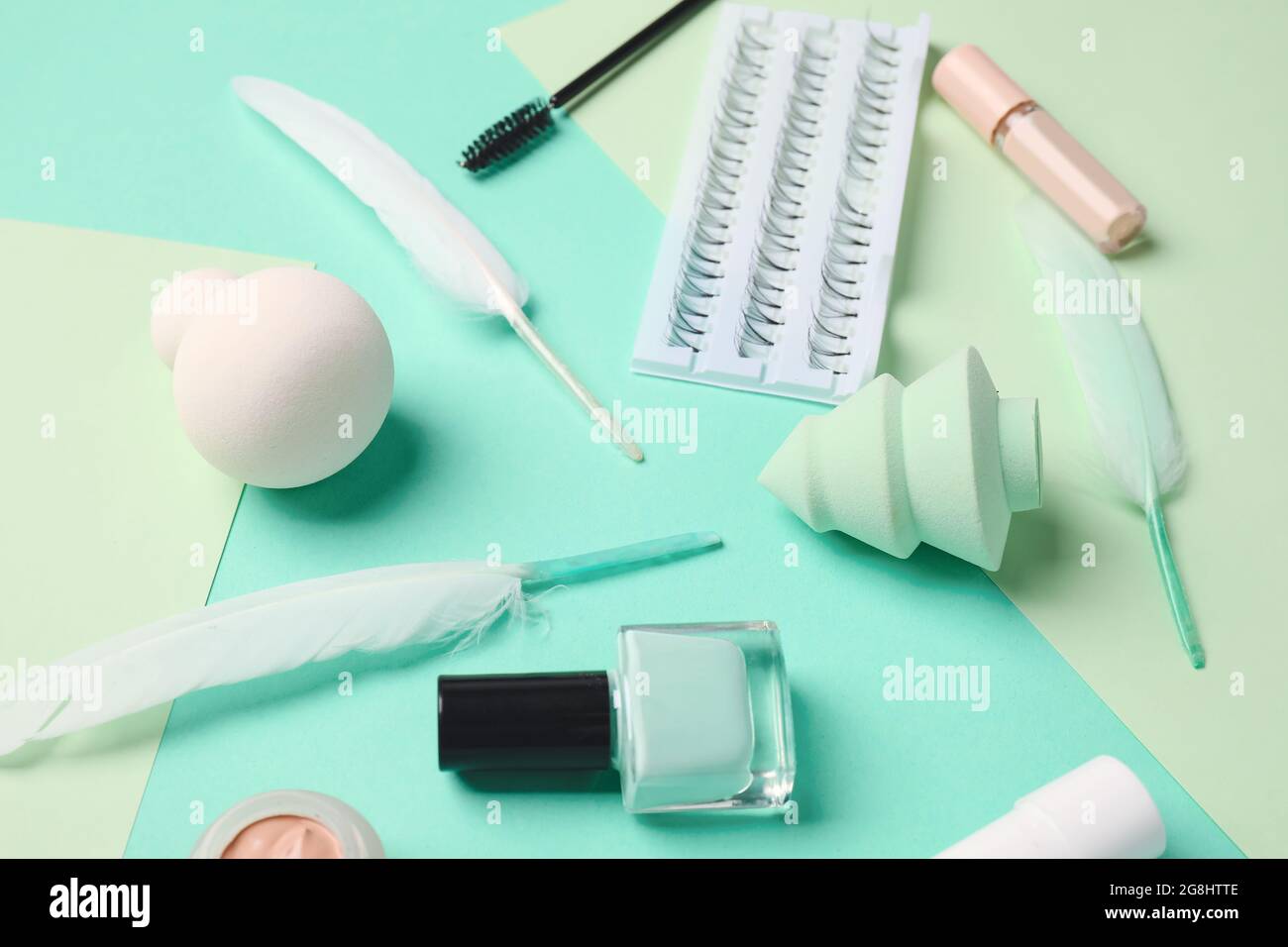 Makeup supplies on color background Stock Photo - Alamy