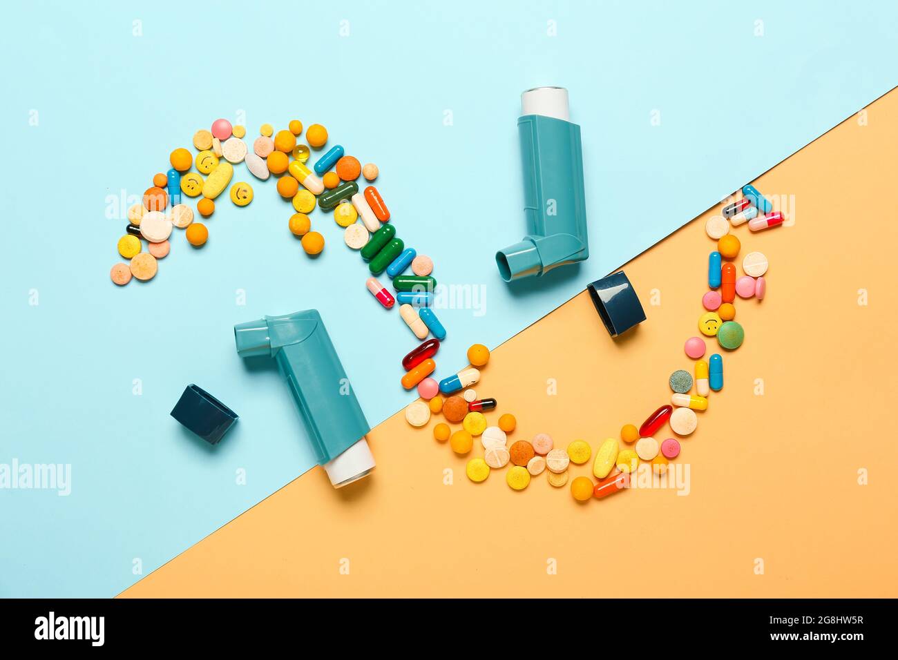 Composition with inhalers and pills on color background Stock Photo - Alamy