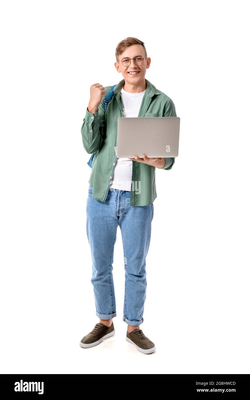 Happy student with laptop on white background Stock Photo - Alamy