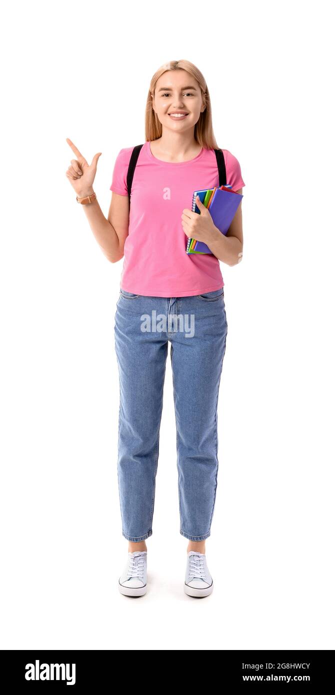 Female student pointing at something on white background Stock Photo ...