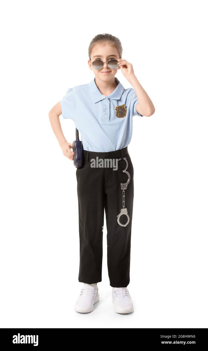 Cute little police officer on white background Stock Photo - Alamy