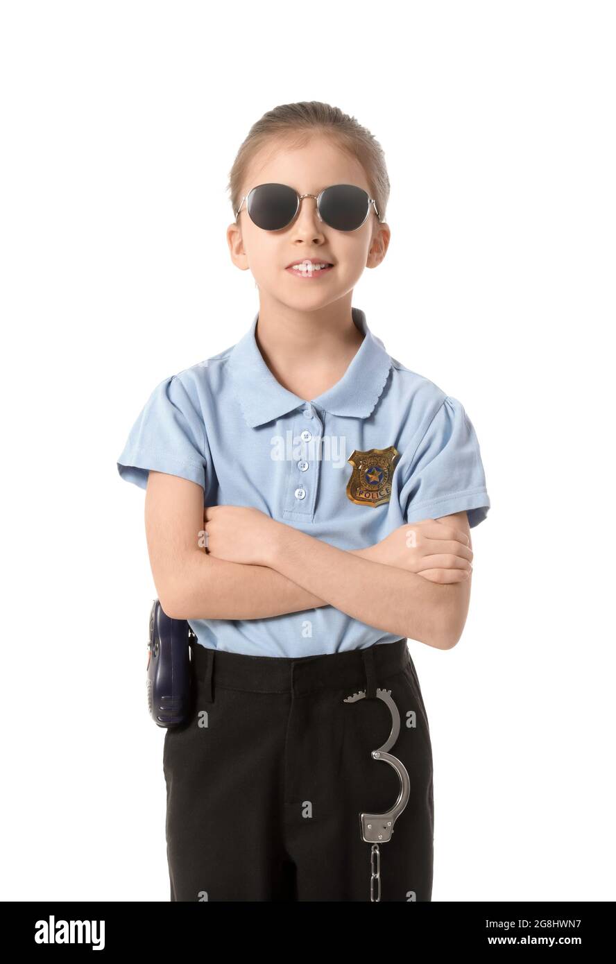 Cute little police officer on white background Stock Photo - Alamy