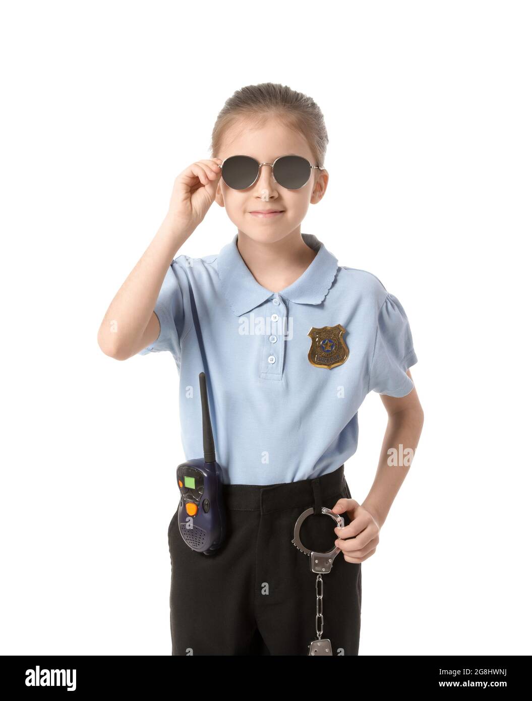 Cute little police officer on white background Stock Photo - Alamy