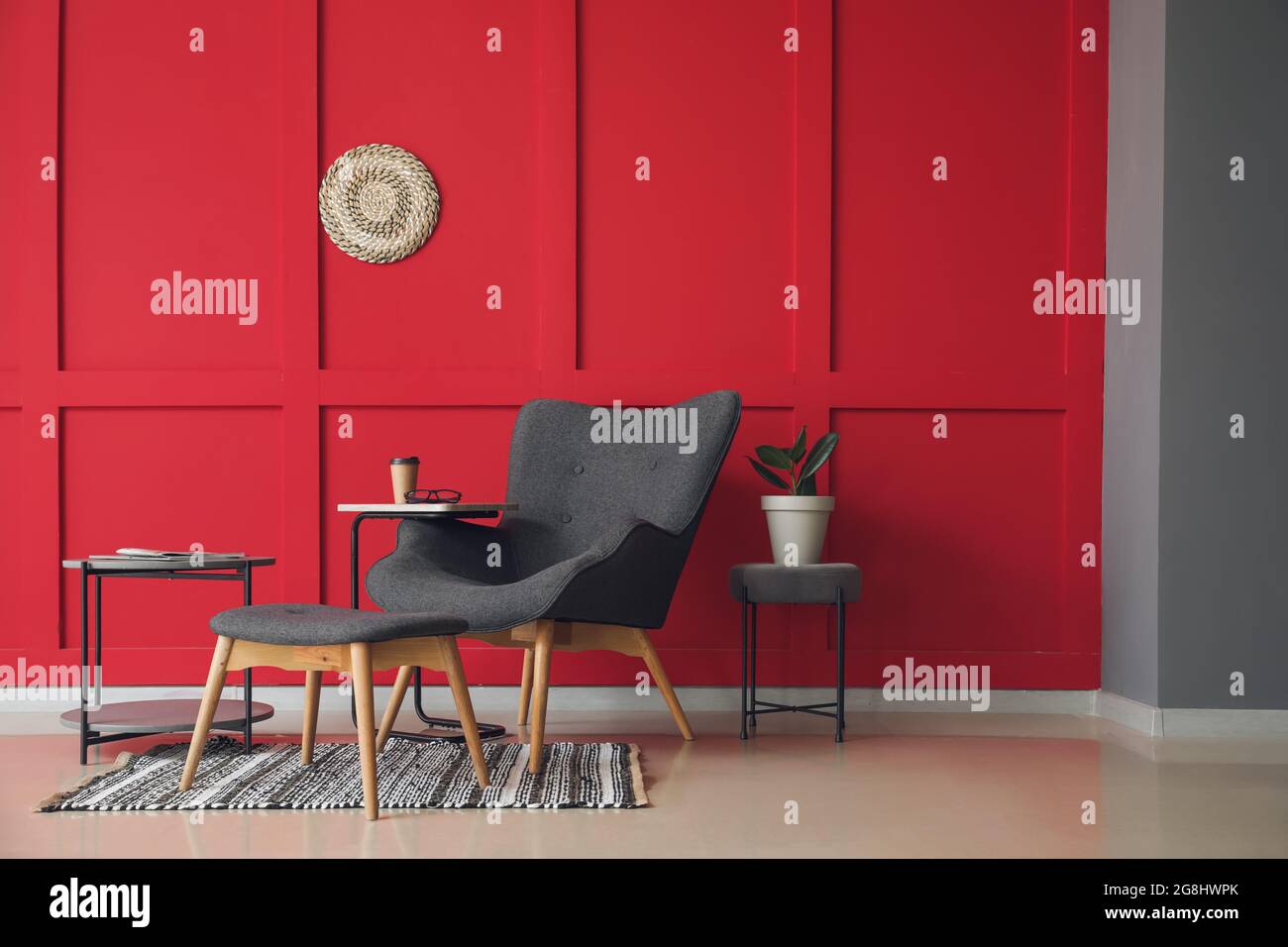 Interior of stylish room with armchair Stock Photo - Alamy