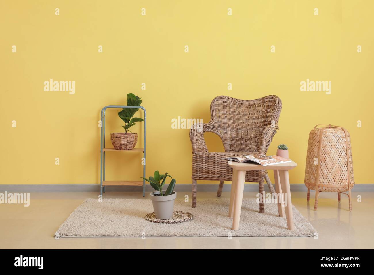Interior of stylish room with armchair Stock Photo - Alamy