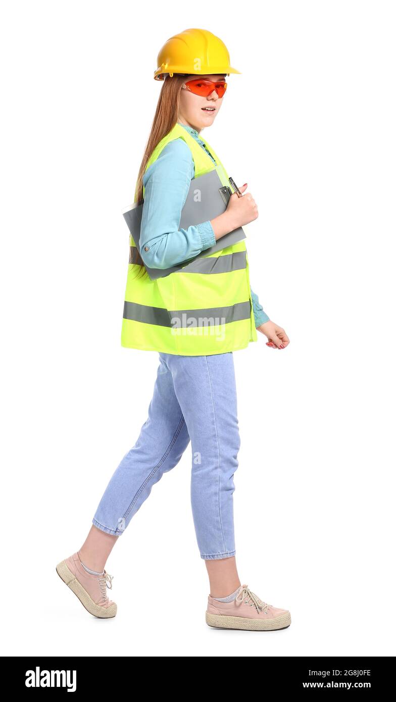 Young female engineer on white background Stock Photo - Alamy