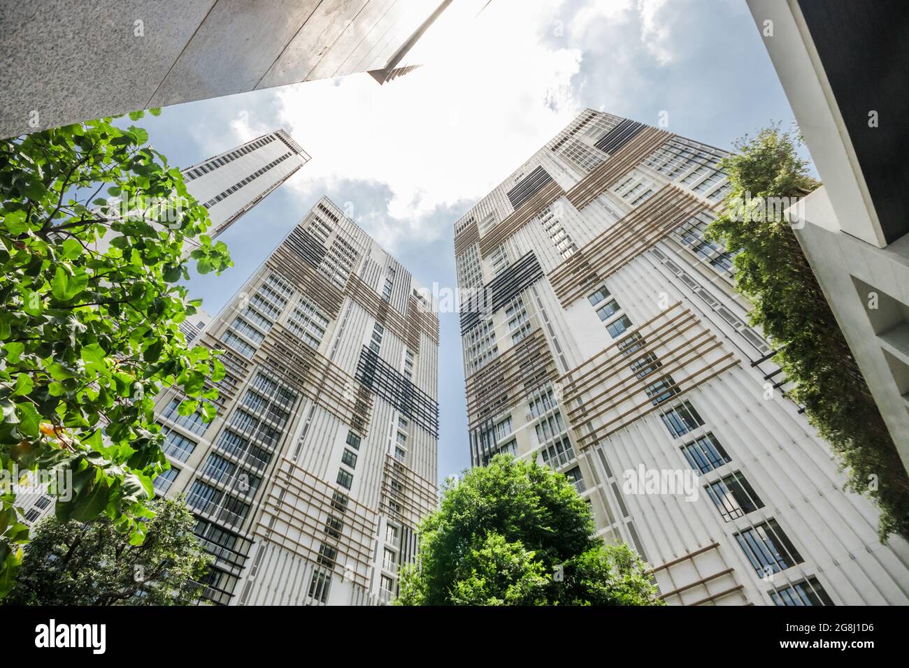 Hight Modern Residents building with tree and Sky Stock Photo - Alamy