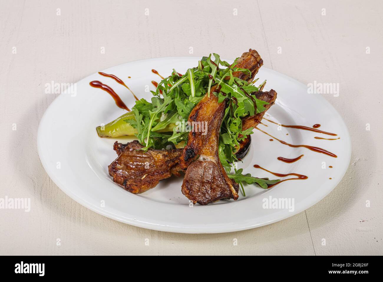 Tasty Grilled rack of lamb barbeque Stock Photo - Alamy