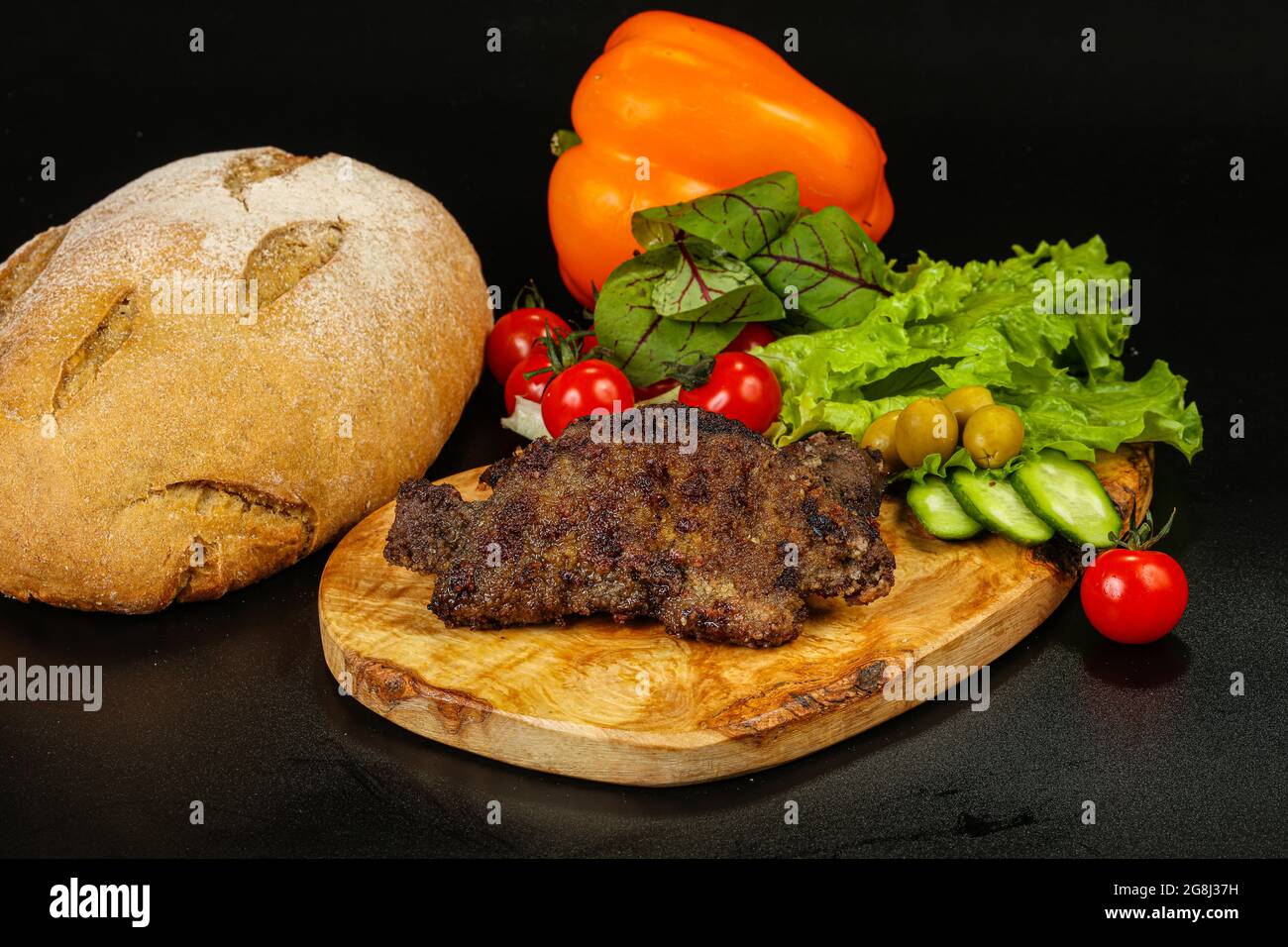 Roasted hot pork liver steak isolated Stock Photo - Alamy