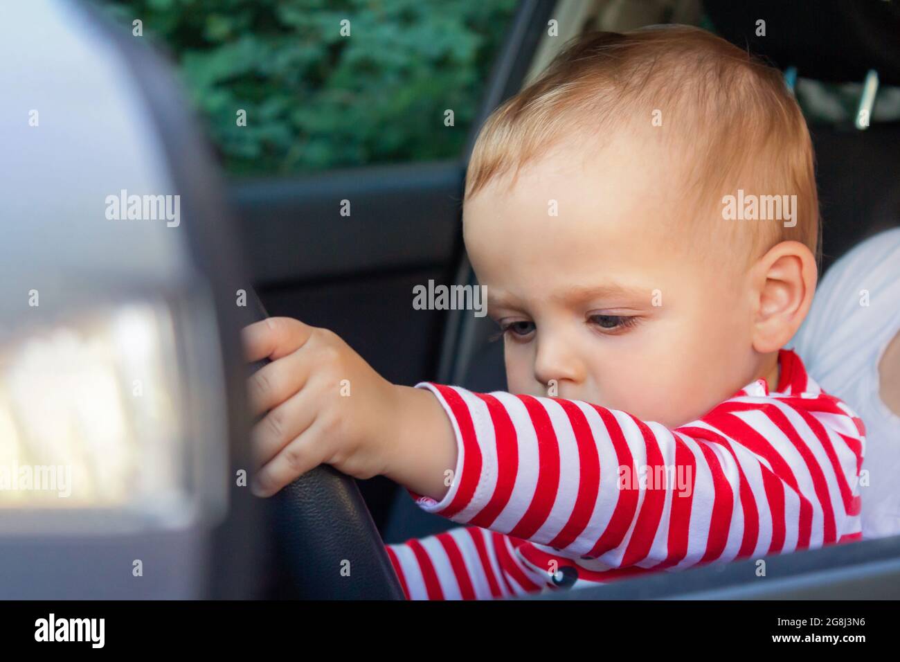 Baby boy driver. Travel with kids concept Stock Photo - Alamy