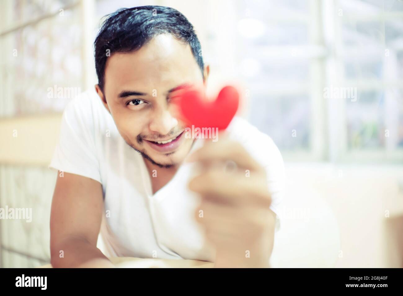 smiling man laughing showing teeth happy.Send your heart to convey ...