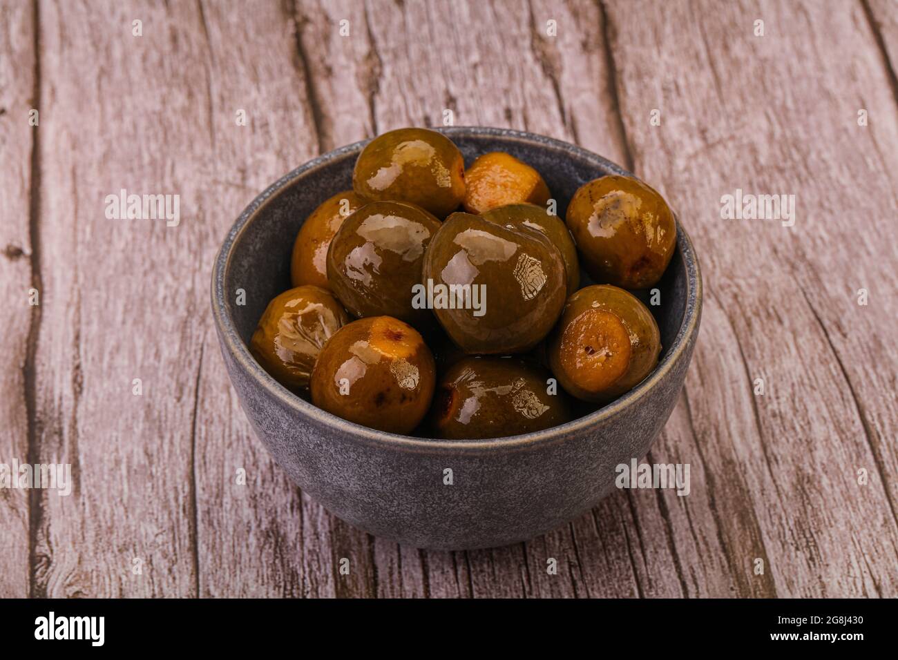 Marinated feijoa fruit in the bowl Stock Photo - Alamy