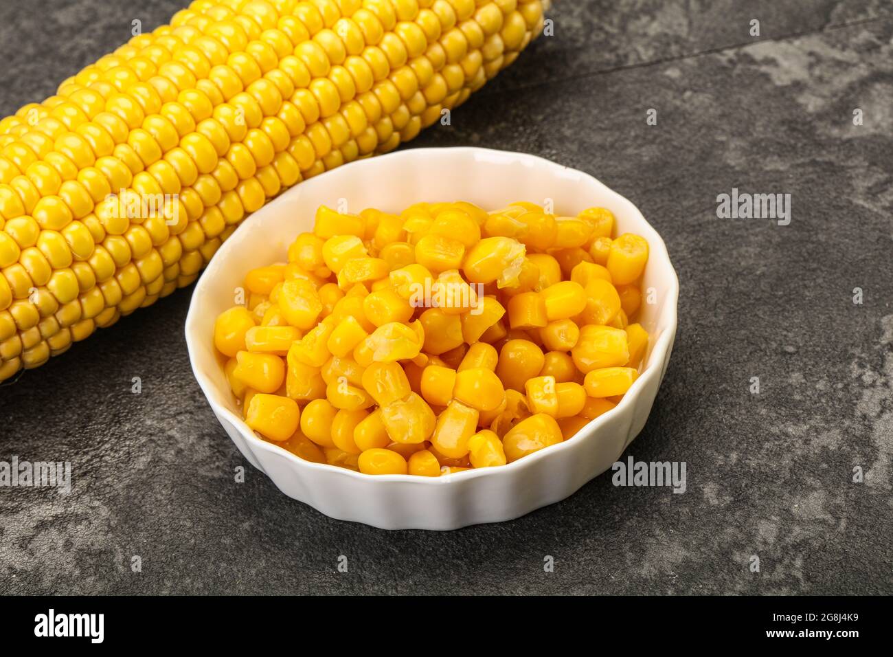 Sweet yellow corn grain in the bowl Stock Photo - Alamy