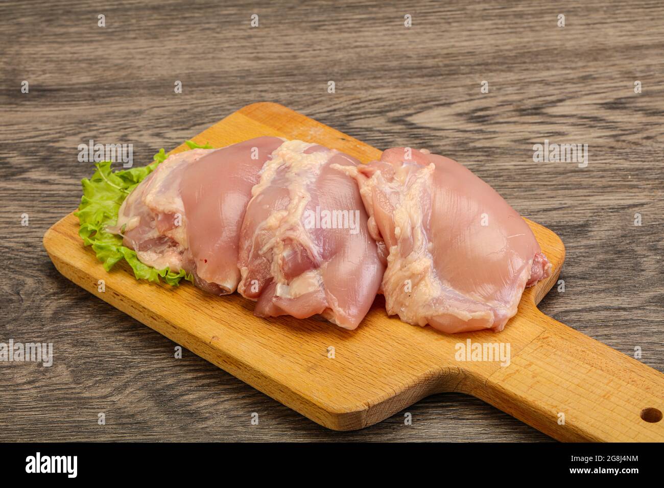 Raw chicken boneless and skinless leg for cooking Stock Photo - Alamy