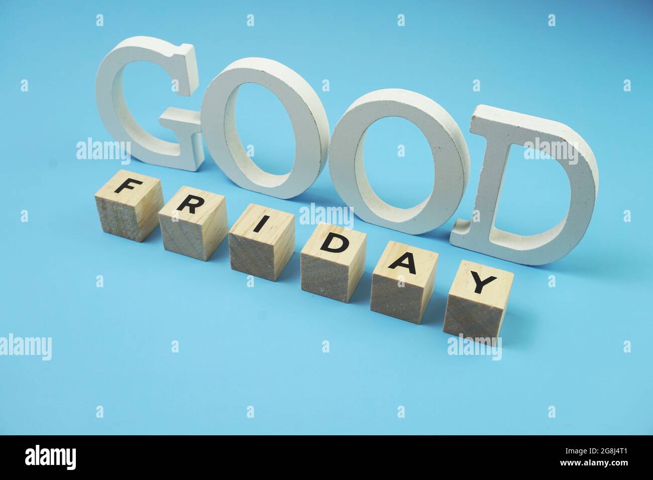 Good Friday Word alphabet letters on blue background Stock Photo - Alamy
