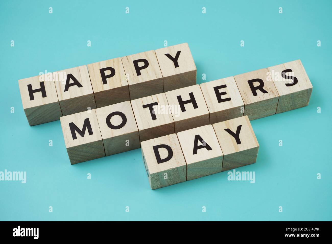 Happy Mother's day alphabet letters top view on blue background Stock ...