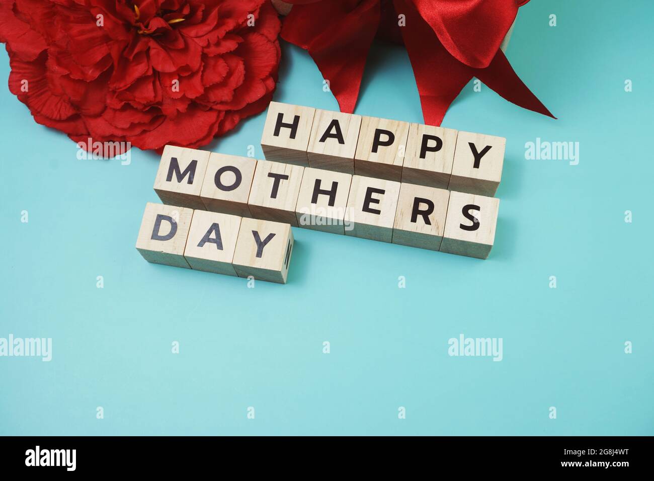Happy Mother's day alphabet letters top view on blue background Stock ...