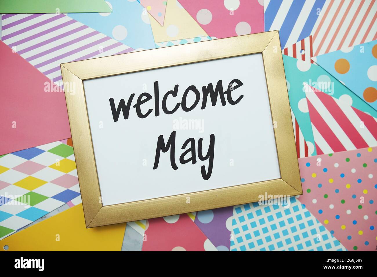 Welcome May text on colorful background Stock Photo - Alamy