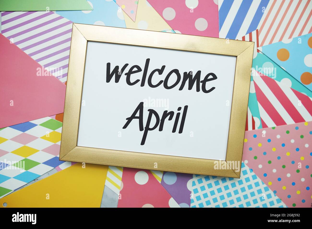 Welcome April text on colorful background Stock Photo - Alamy
