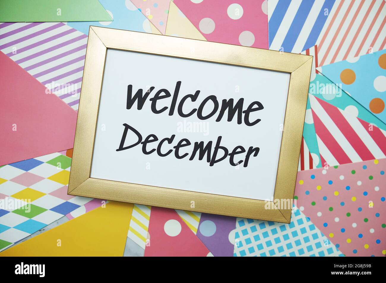 Welcome December text on colorful background Stock Photo - Alamy