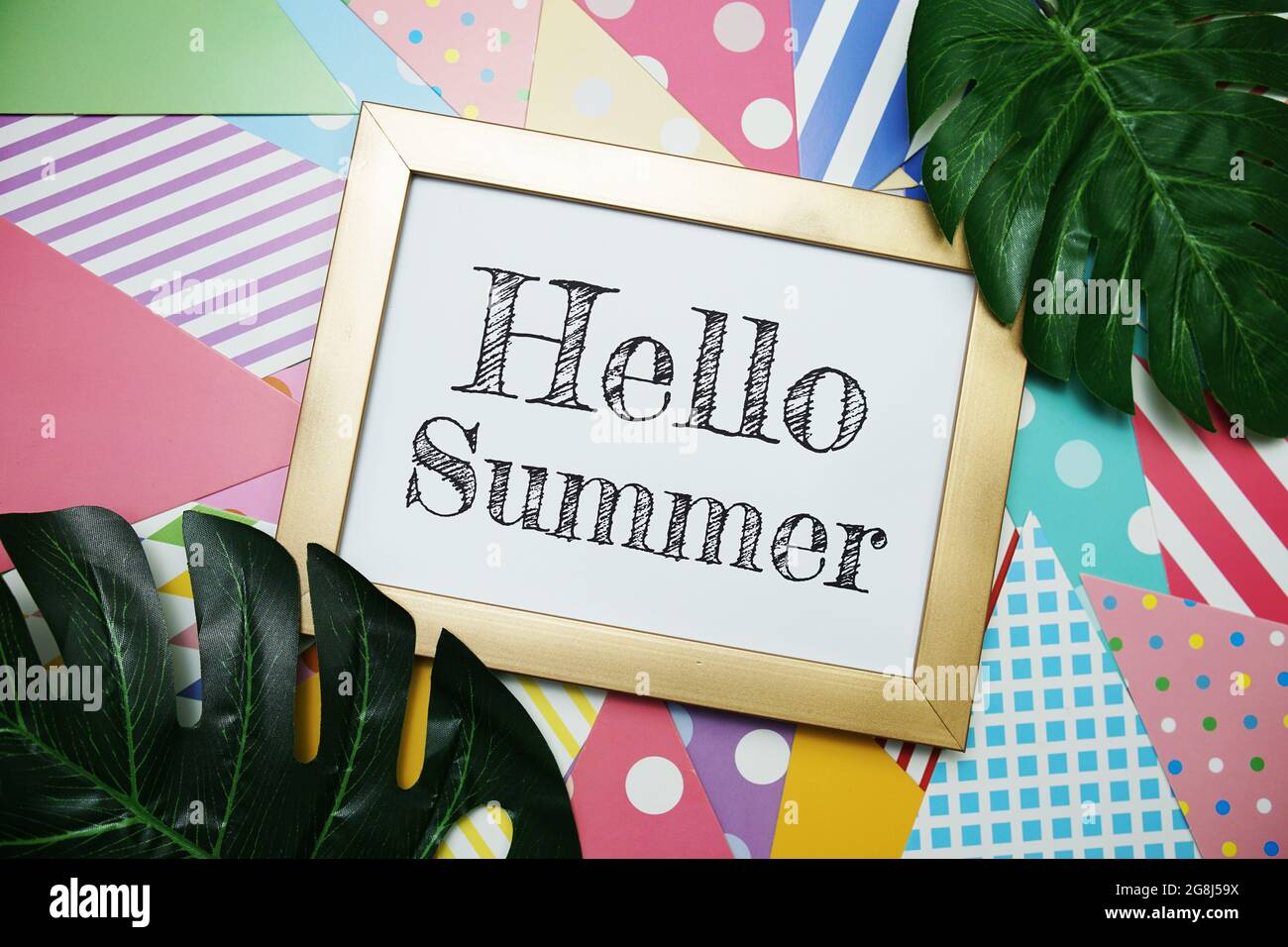 Hello Summer text with green leave decoration on colorful background Stock Photo - Alamy