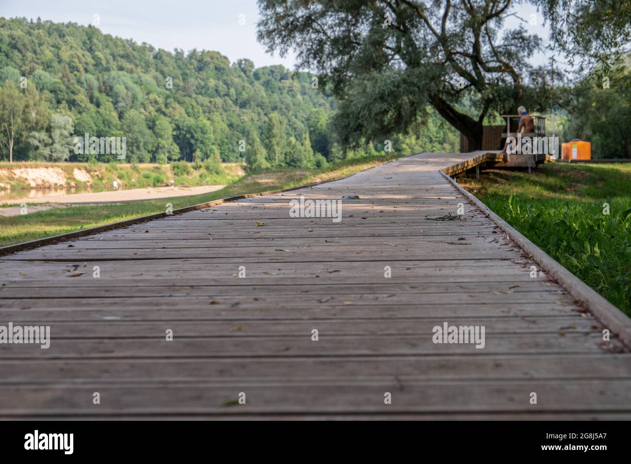 Wooden footpath to a public beach in the town Stock Photo - Alamy