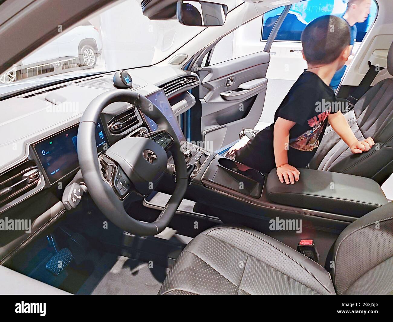 A new energy smart car is presented at a NIO flagship store in Shanghai ...