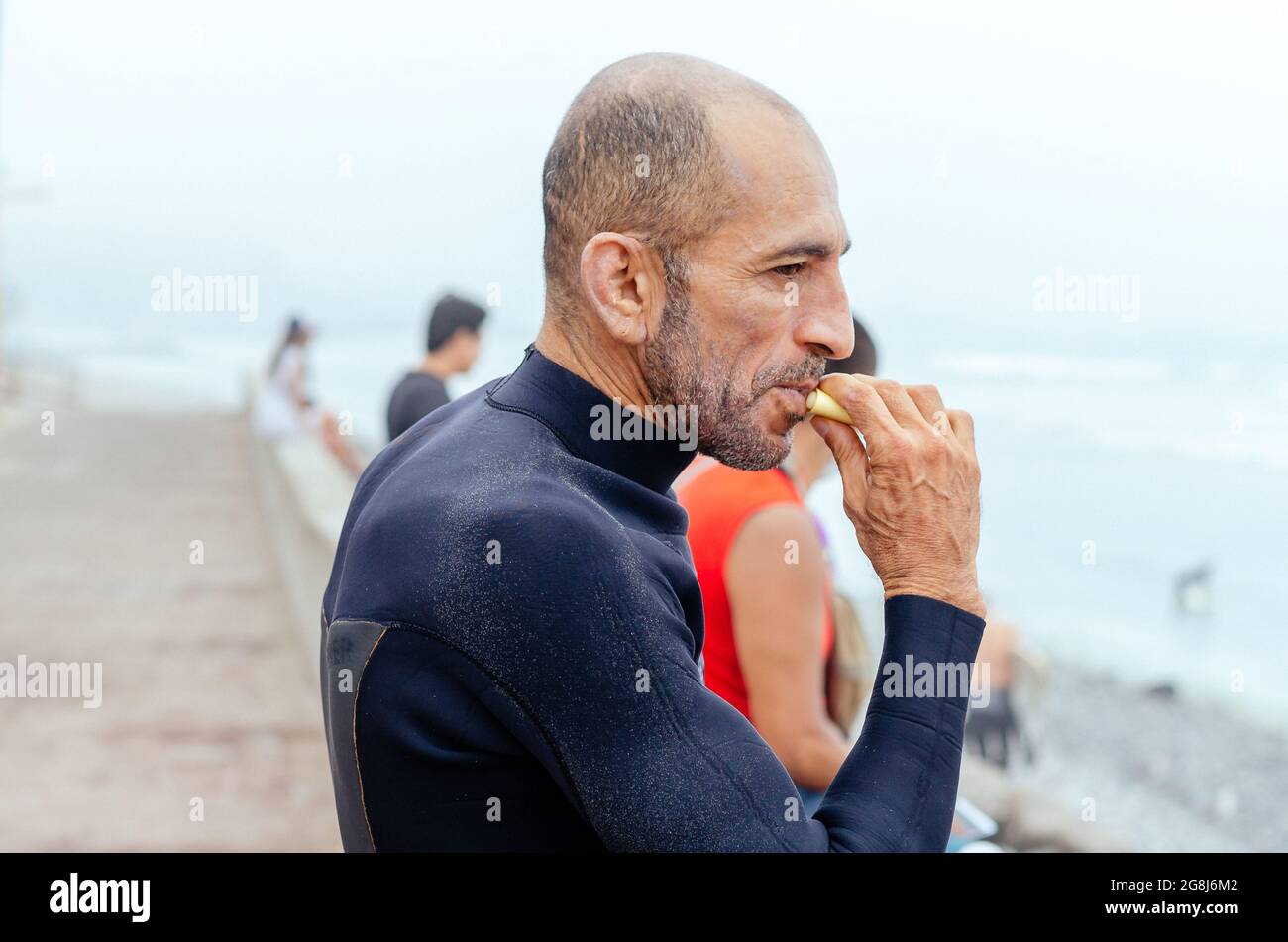 Grey hair surfer hi-res stock photography and images - Alamy