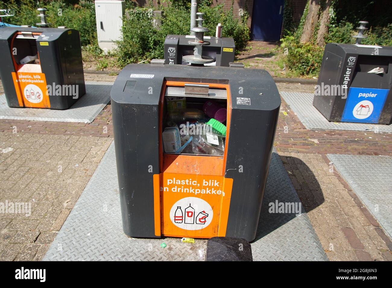 Waste separation with separate underground containers for plastics and ...