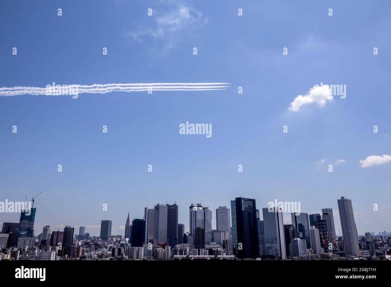 Tokyo, Japan. 21st July, 2021. Japan Air Force Blue Impulse flyover ...