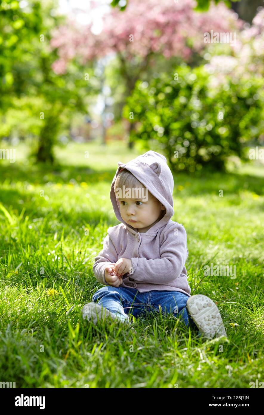 Little girl play in the park and have a good time. The concept of a ...