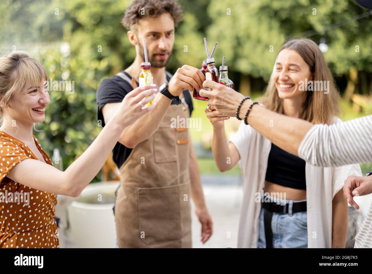 Female friends drinking outside alcohol hi-res stock photography and ...