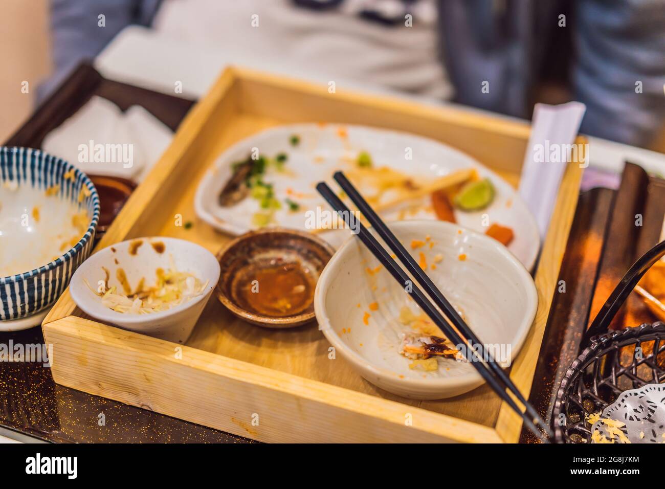 Messy table after meal in Japanese restaurant. Dirty, finish meal ...