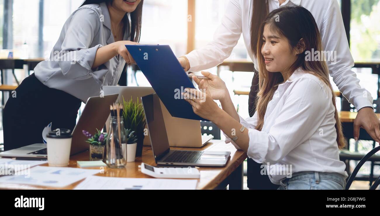 Business team discussing together during meeting at office. Colleagues ...