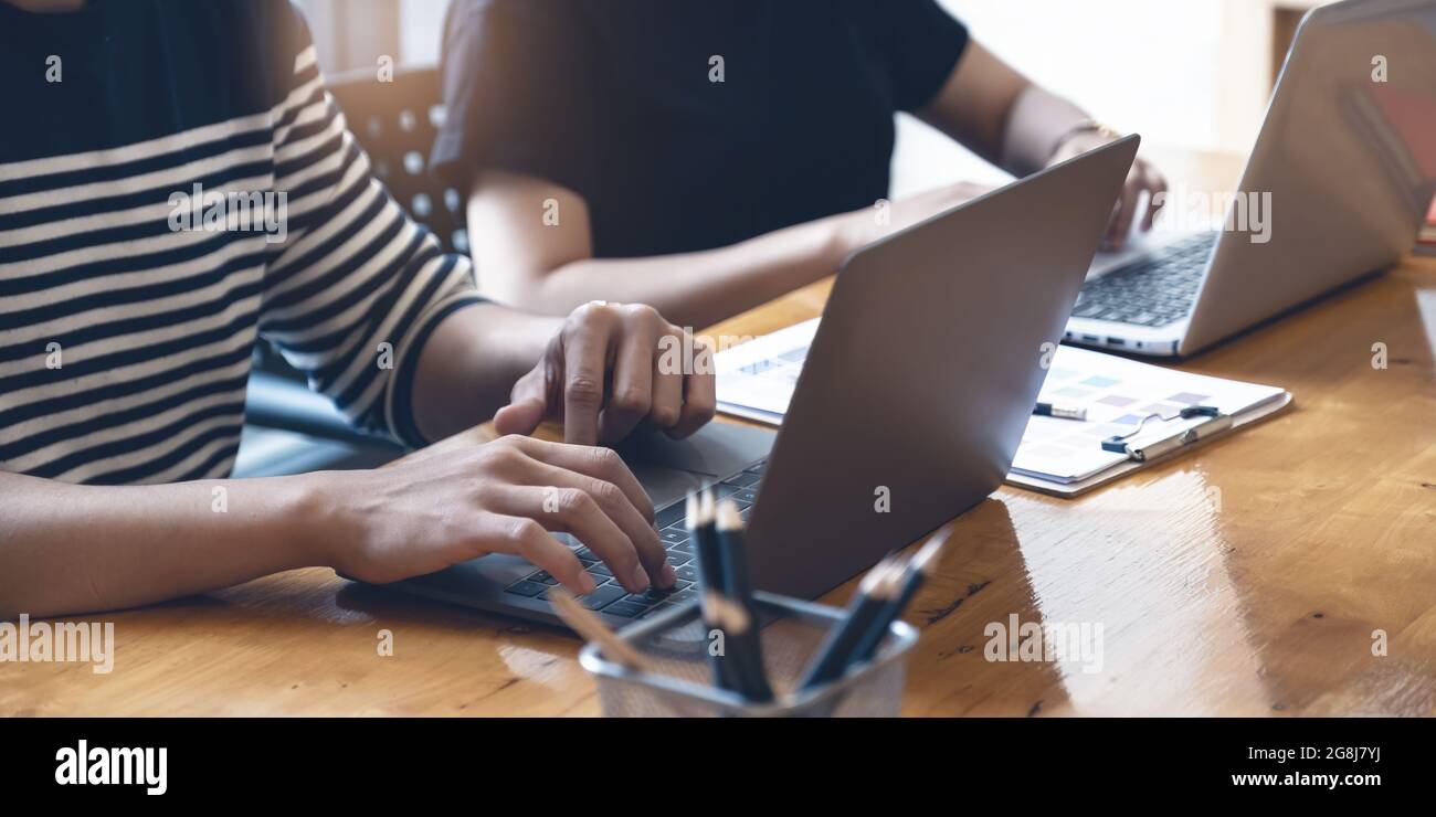 Asian student focus learning online course and watching video tutorial ...