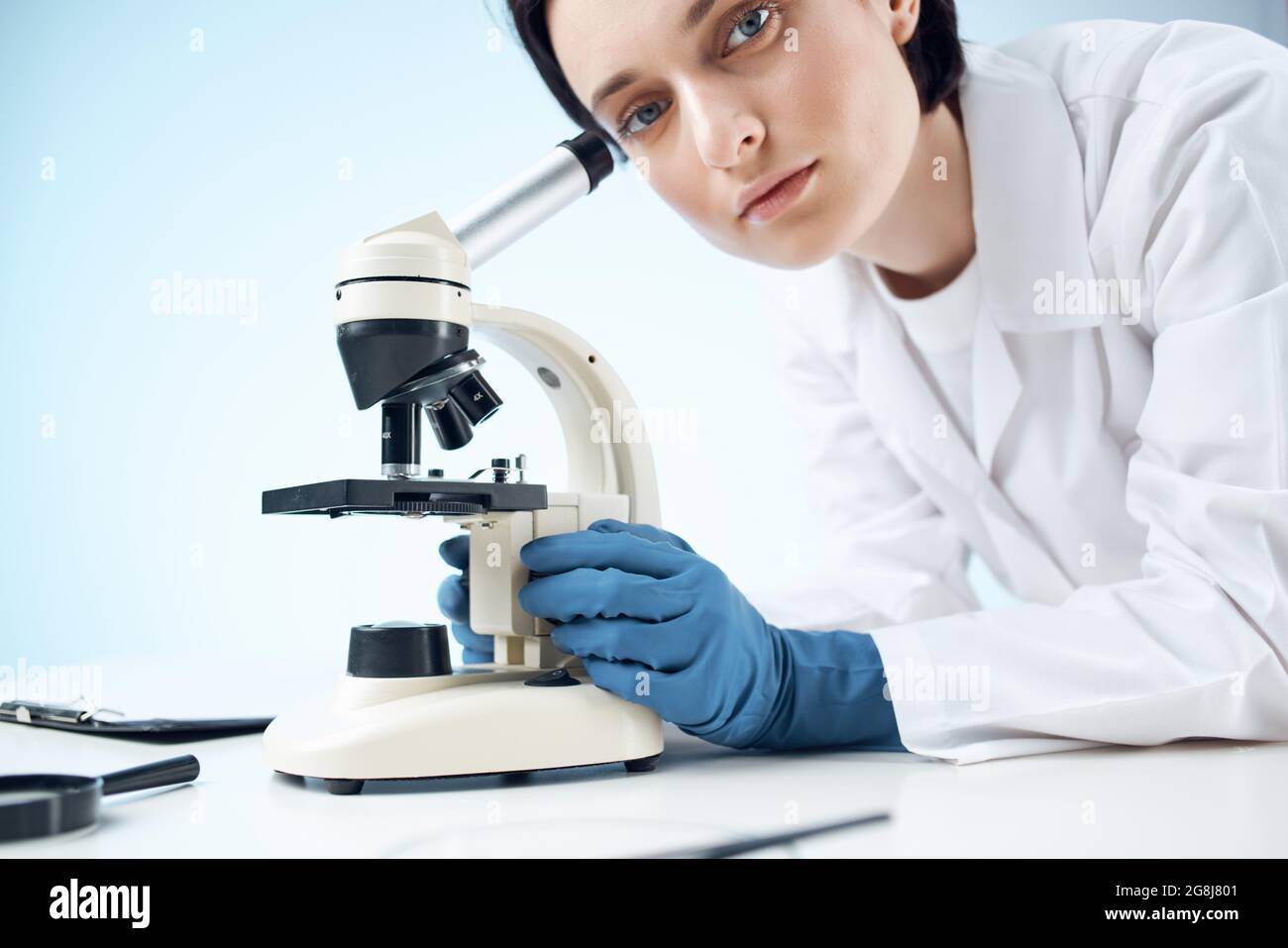 female doctor laboratory science research microscope Stock Photo - Alamy