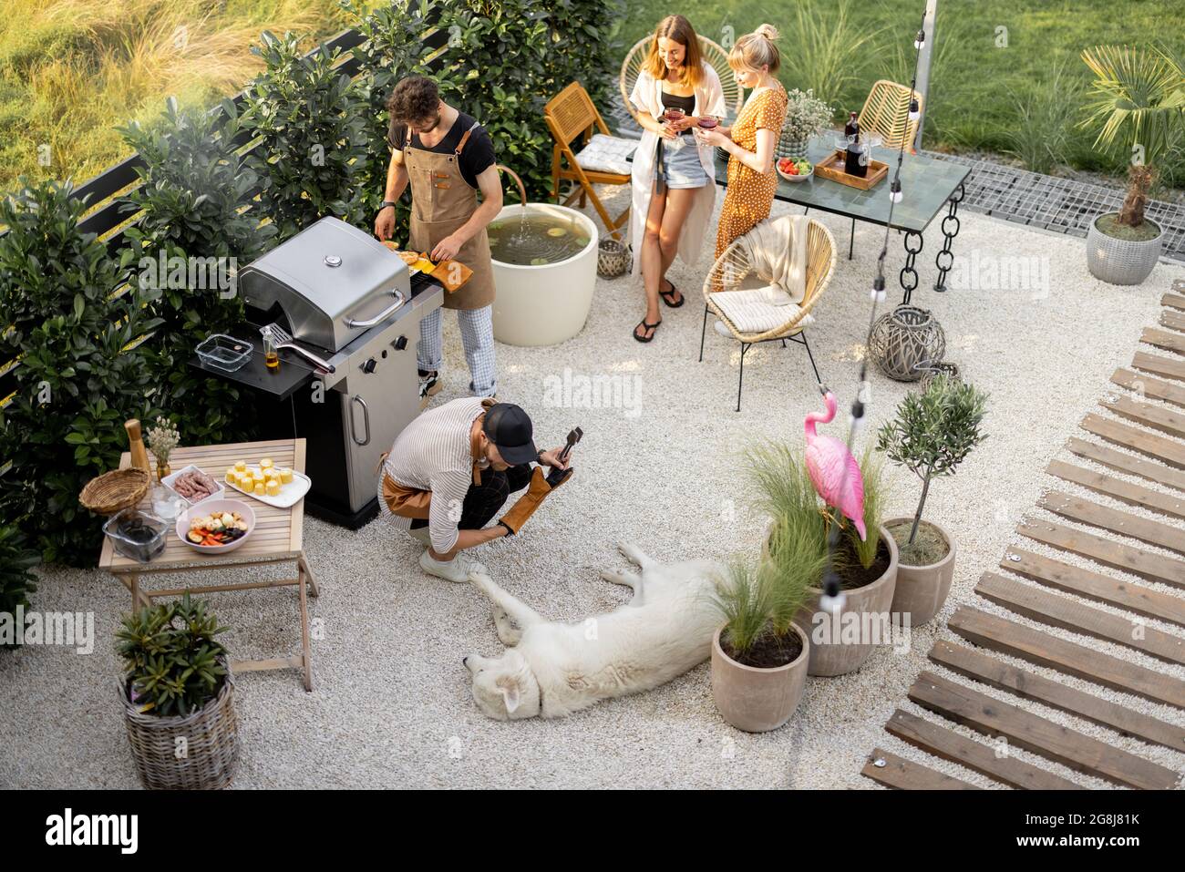 People hanging out at backyard Stock Photo - Alamy