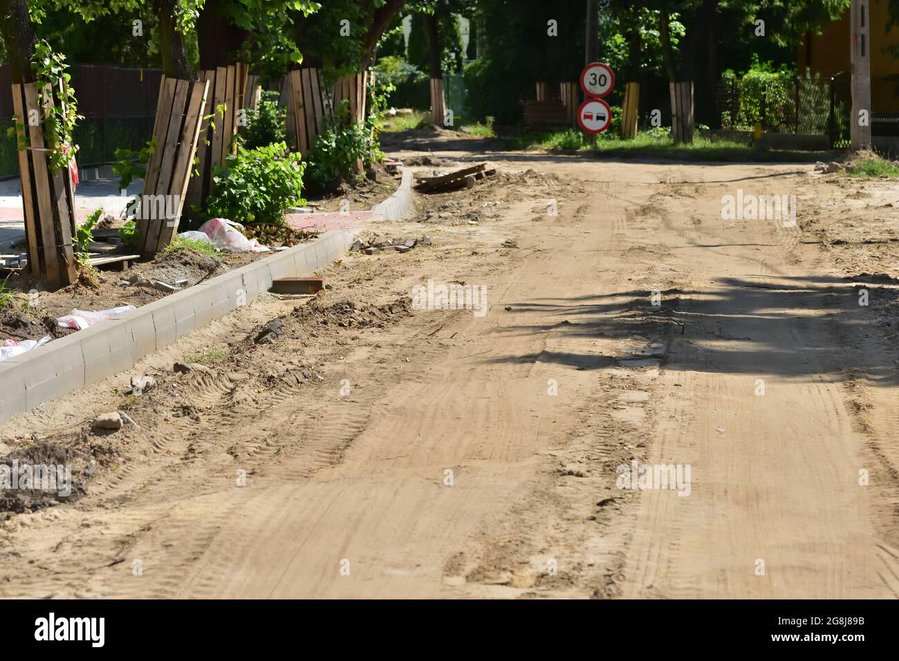 A renovated city road among trees. Summer Stock Photo - Alamy
