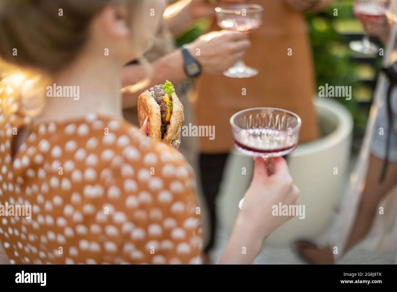 People celebrating with alcohol outdoors Stock Photo - Alamy