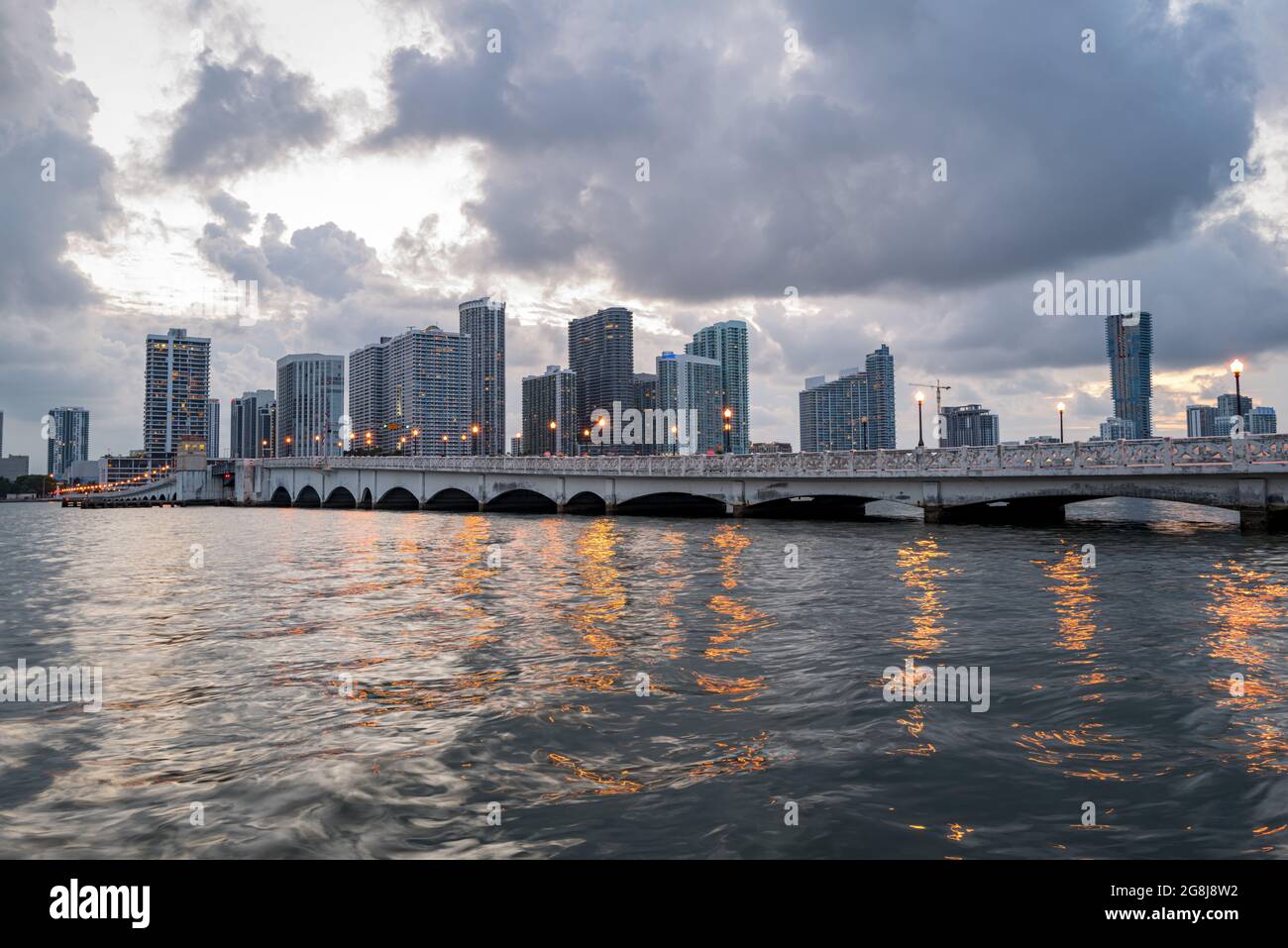 Miami at sunset. Miami Florida, colorful skyline of Macarthur causeway ...