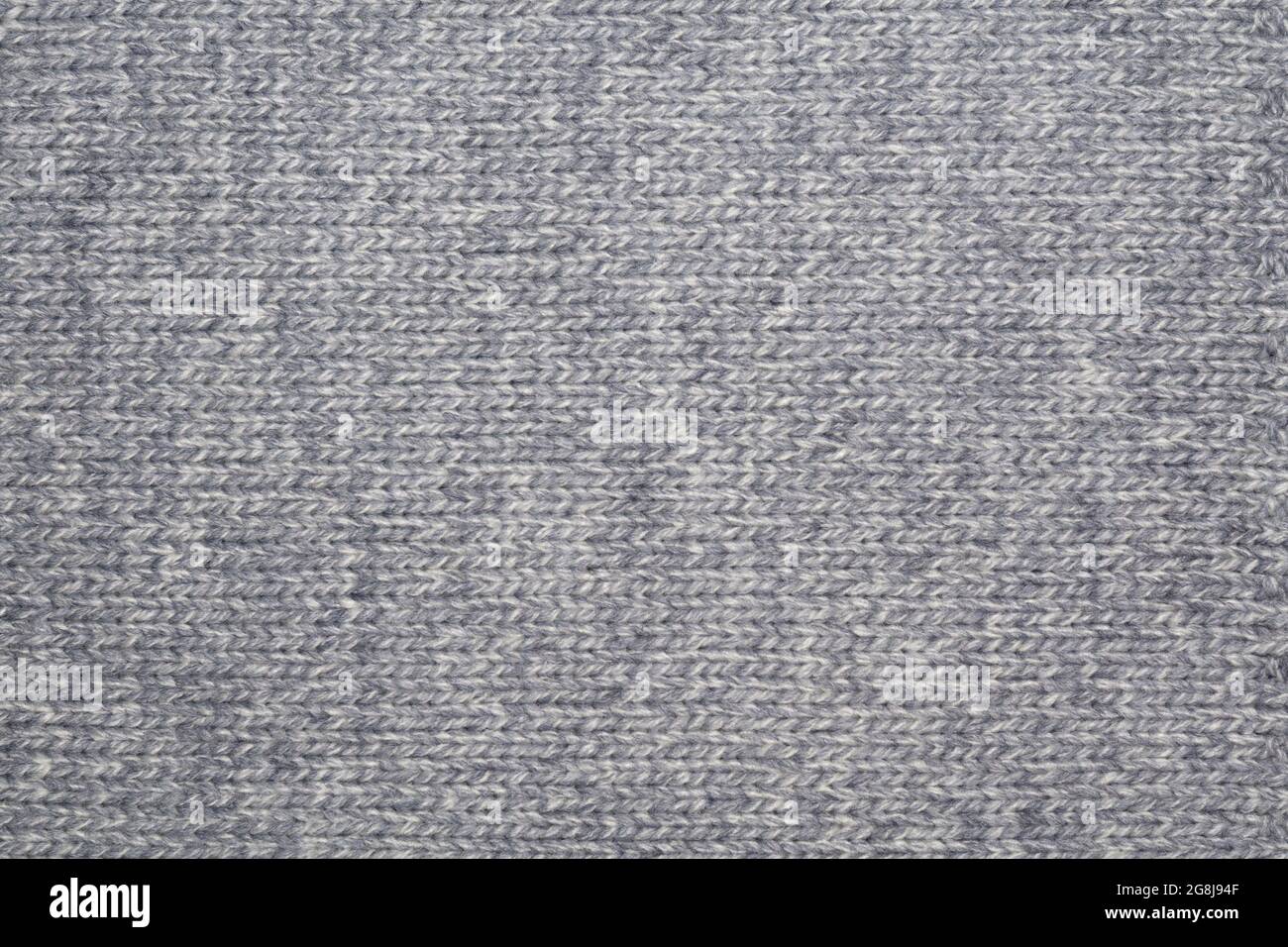 Close up photo of gray wool sweater texture as abstract background ...