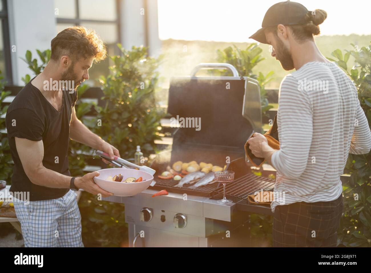 Bbq grill meat sunset hi-res stock photography and images - Alamy