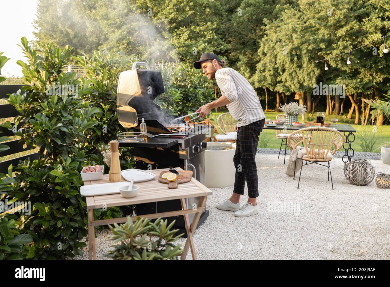 Man cooking dish hi-res stock photography and images - Alamy