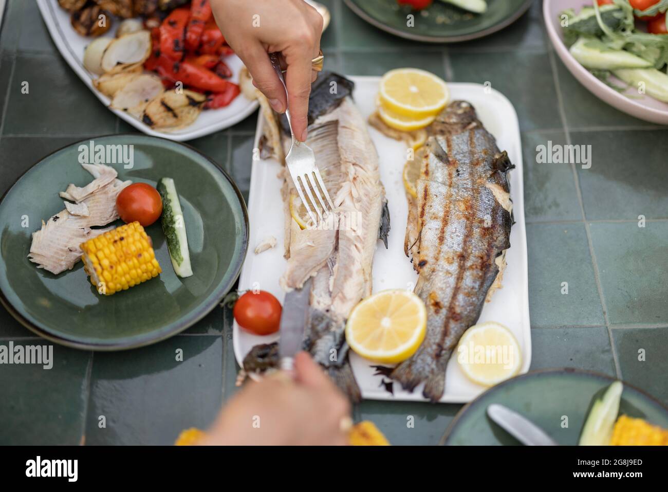 Restaurant fish outside meal grilled hi-res stock photography and ...