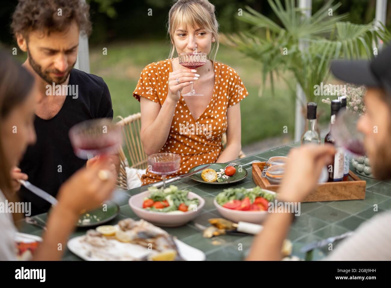 Pretty couple have fun at lunch outdoors Stock Photo - Alamy