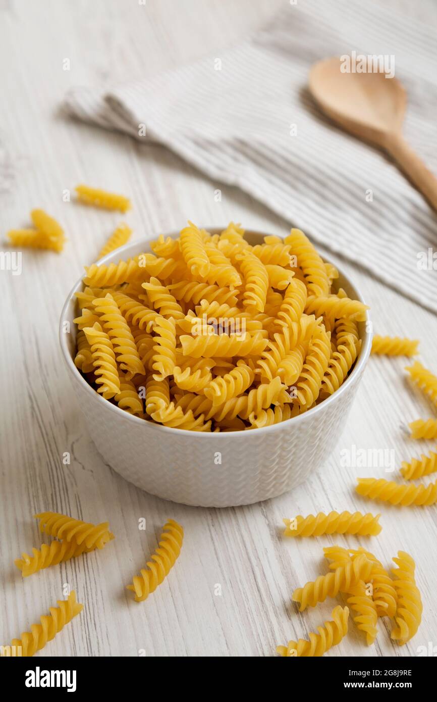 Uncooked yellow organic rotini hi-res stock photography and images - Alamy