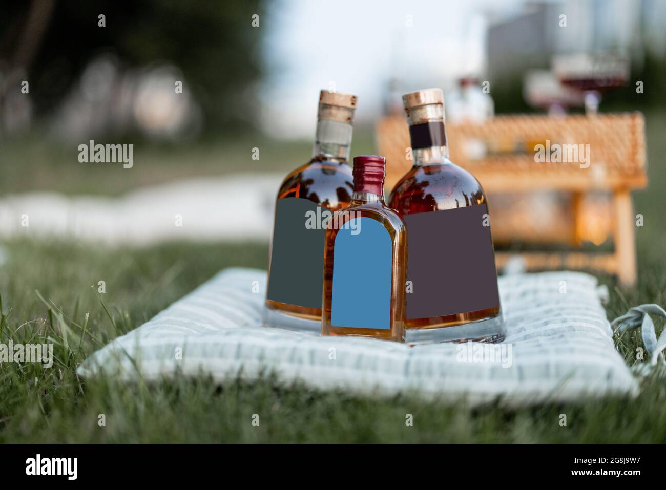 Alcohol bottles on a picnic Stock Photo - Alamy