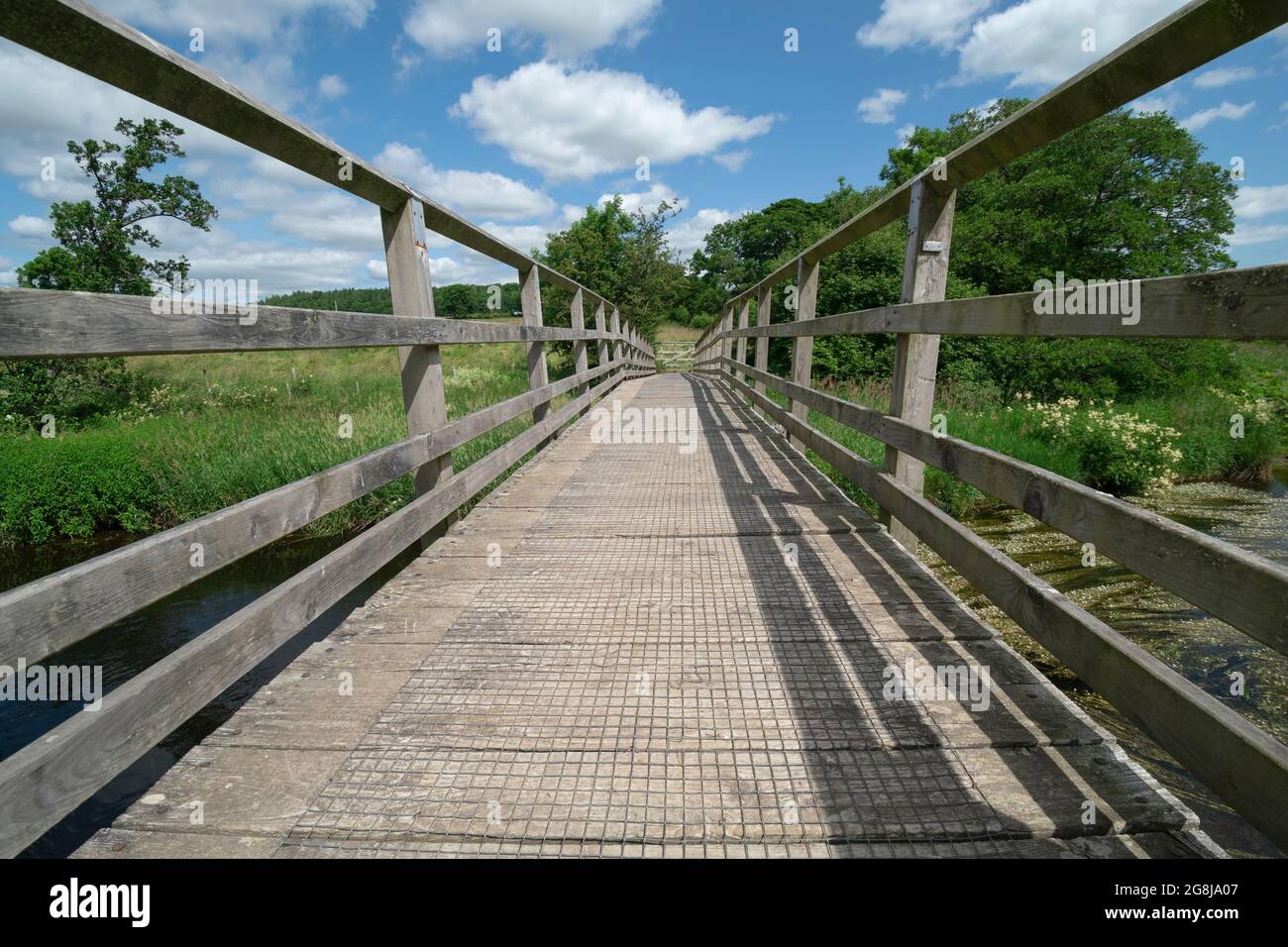 Wooden bridge over the River Lowther on the Lowther Loop of the ...