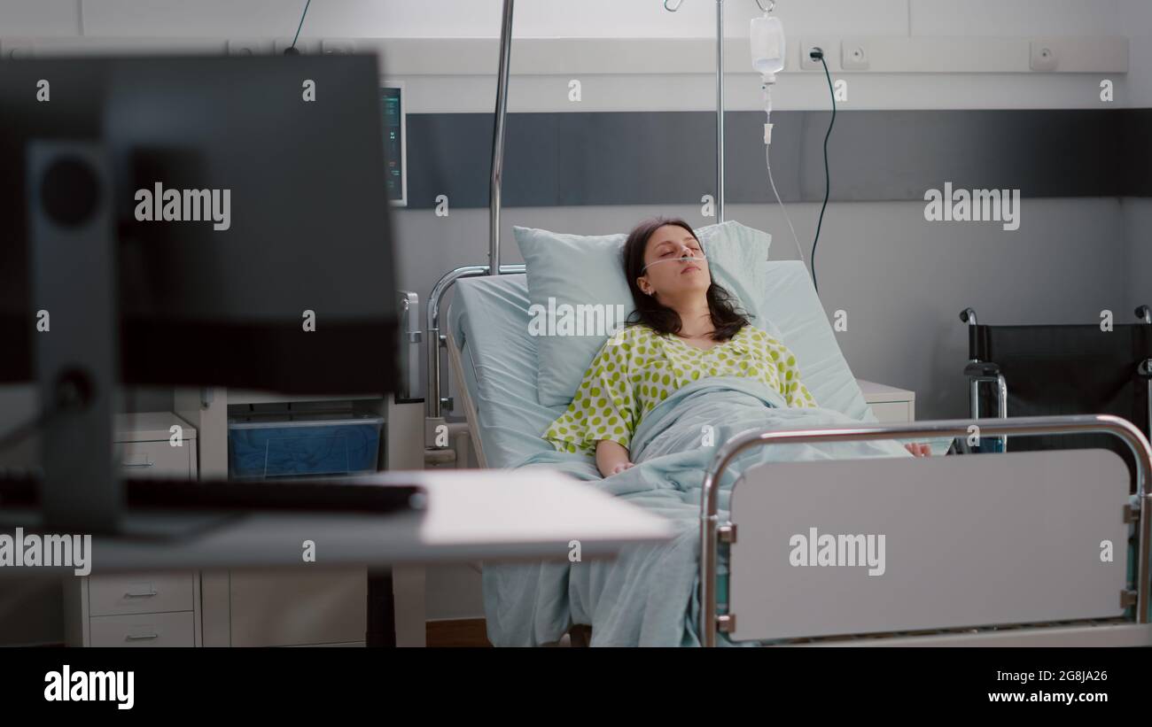 Front view of sick caucasian female falling asleep recovering after ...